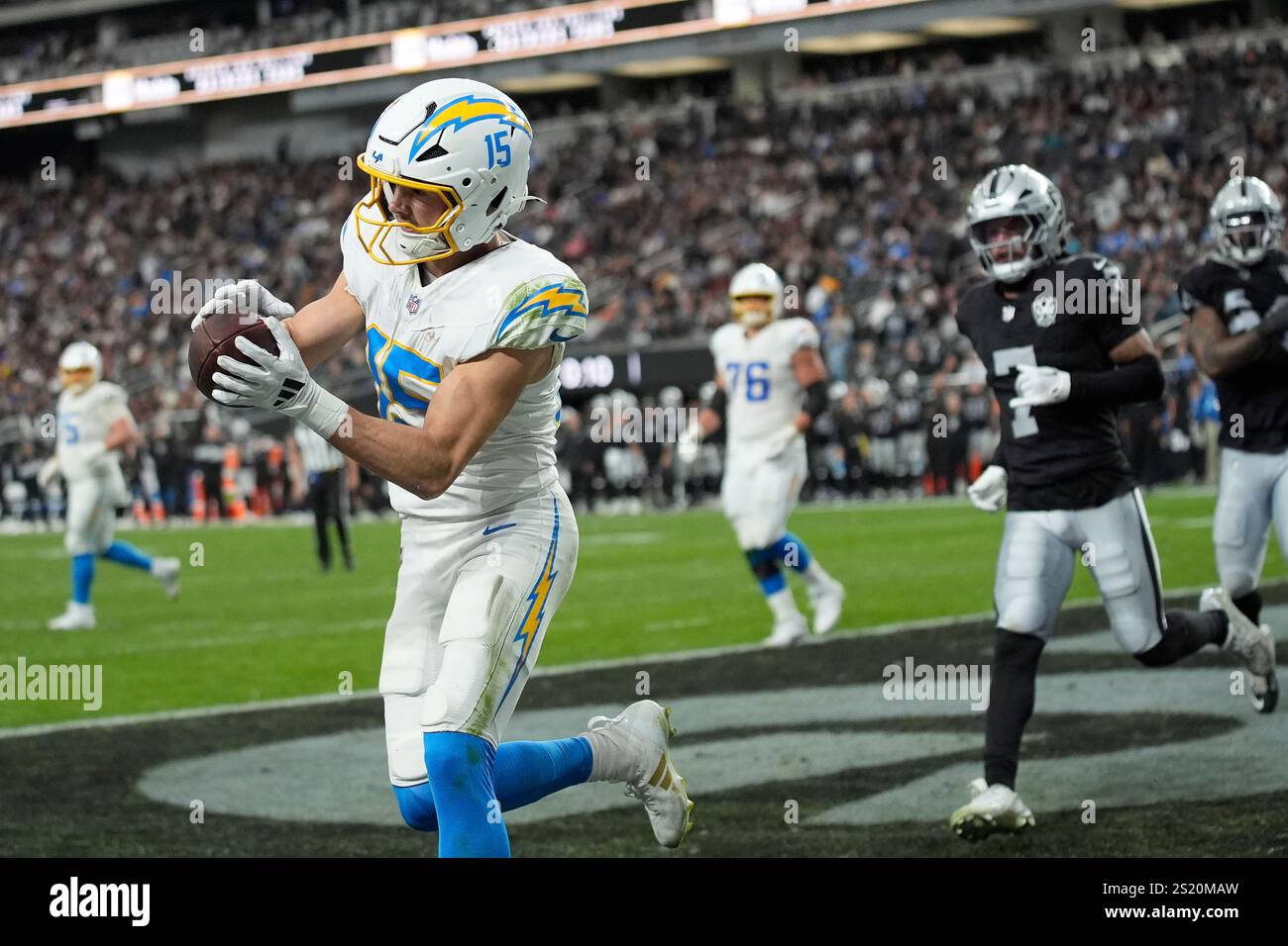 Los Angeles Chargers wide receiver Ladd McConkey (15) scores on a two point conversion during ...