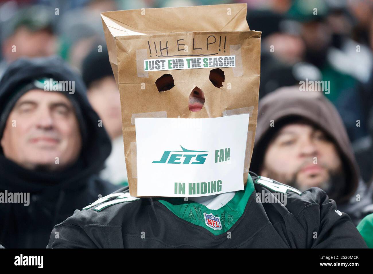 East Rutherford, United States. 05th Jan, 2025. A Jets fan wears a ...