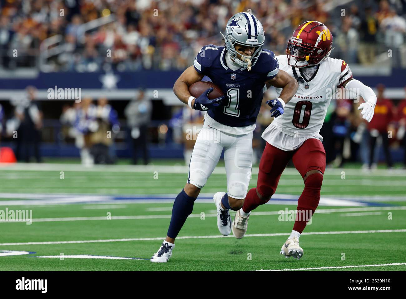 Dallas Cowboys wide receiver Jalen Tolbert (1) carries the ball after ...
