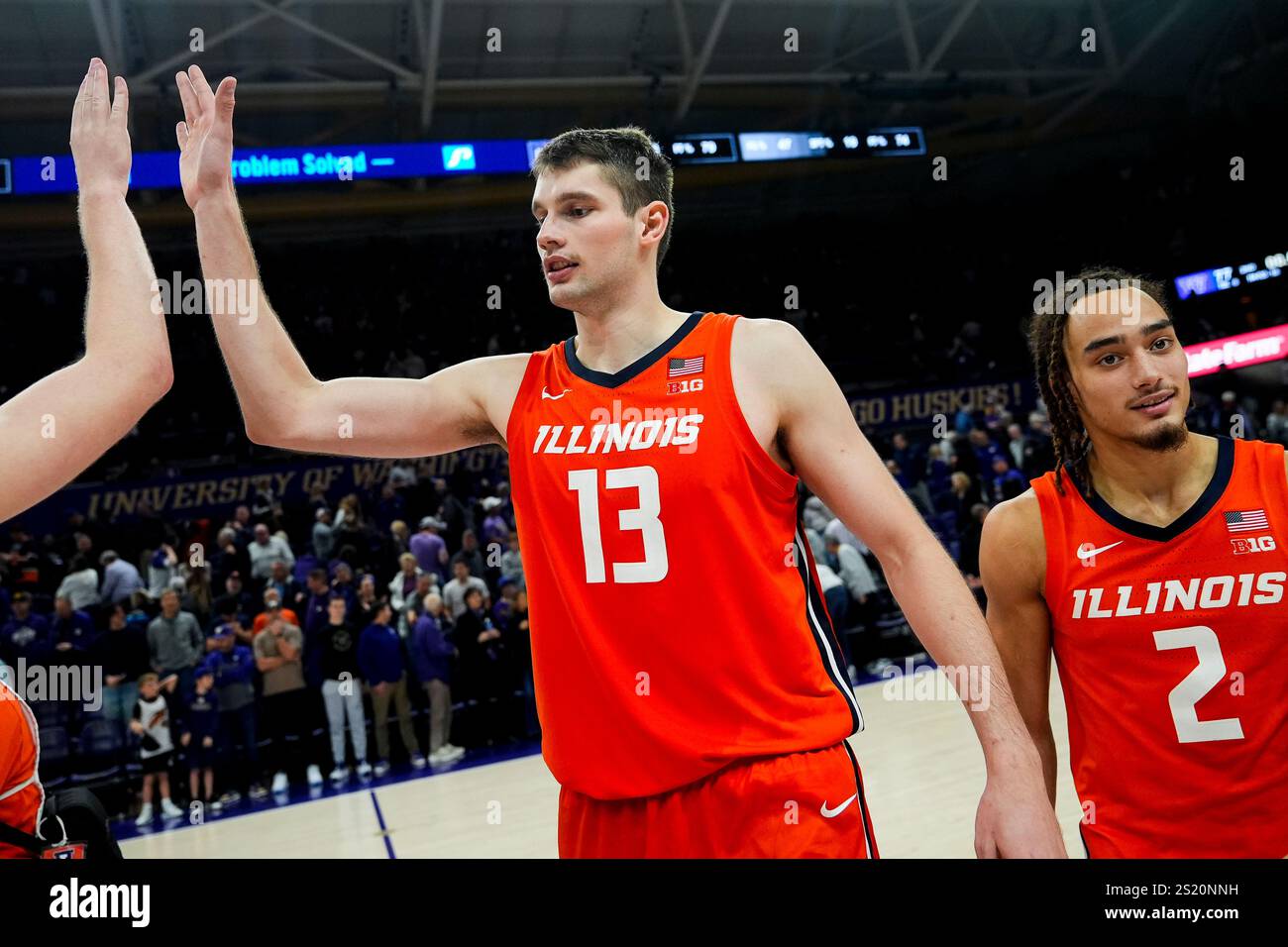 Illinois center Tomislav Ivisic (13) reacts with guard Dra Gibbs ...