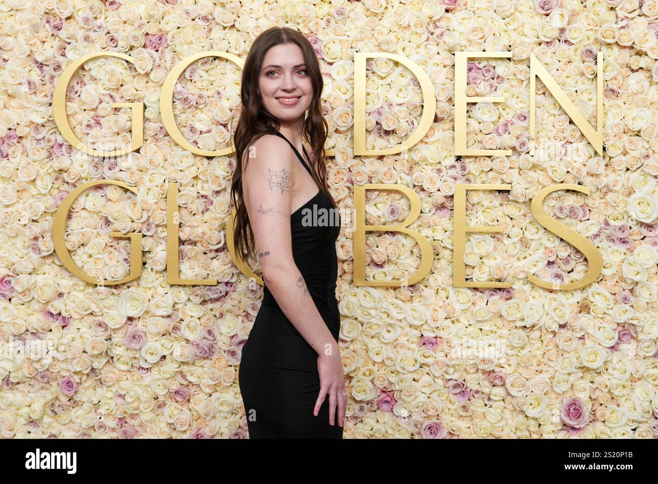 Lizzy McAlpine arrives at the 82nd Golden Globes on Sunday, Jan. 5, 2025, at the Beverly Hilton ...