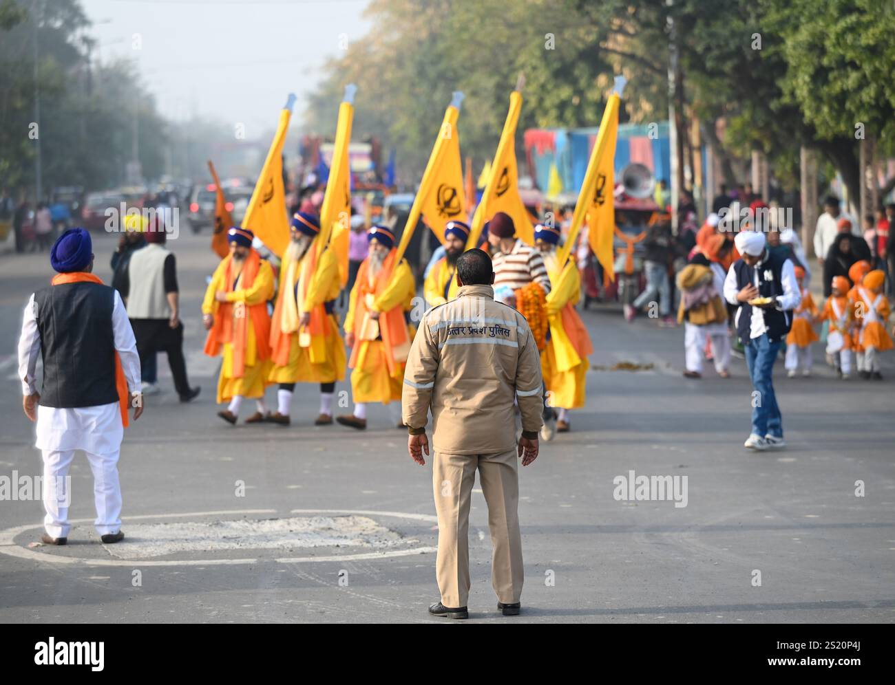 NOIDA, INDIA - JANUARY 5: Sikh devotees display Gatka martial art skills during a 'Nagar Kirtan ...