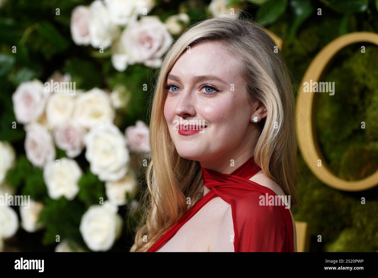Dakota Fanning arrives at the 82nd Golden Globes on Sunday, Jan. 5 ...