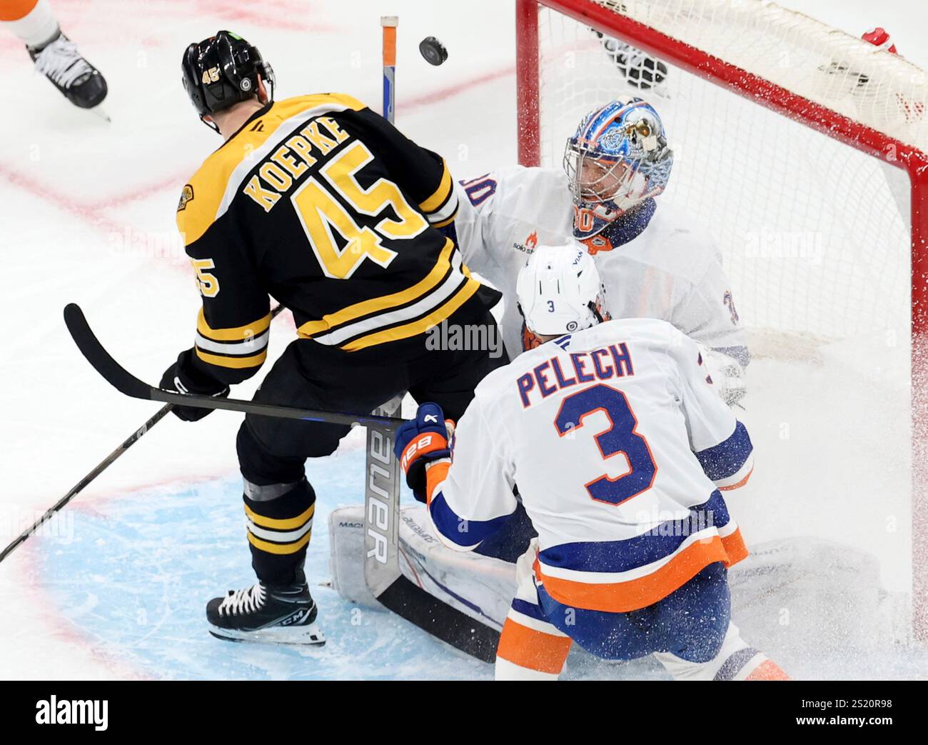 Boston Bruins left wing Cole Koepke (45) scores against New York ...