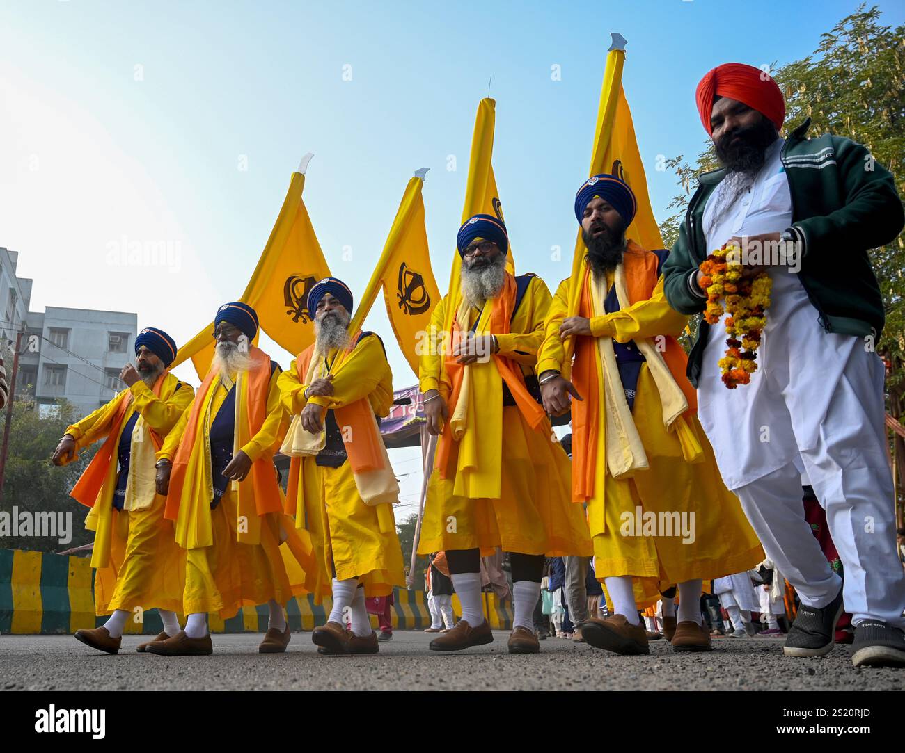 NOIDA, INDIA - JANUARY 5: Sikh devotees display Gatka martial art skills during a 'Nagar Kirtan ...