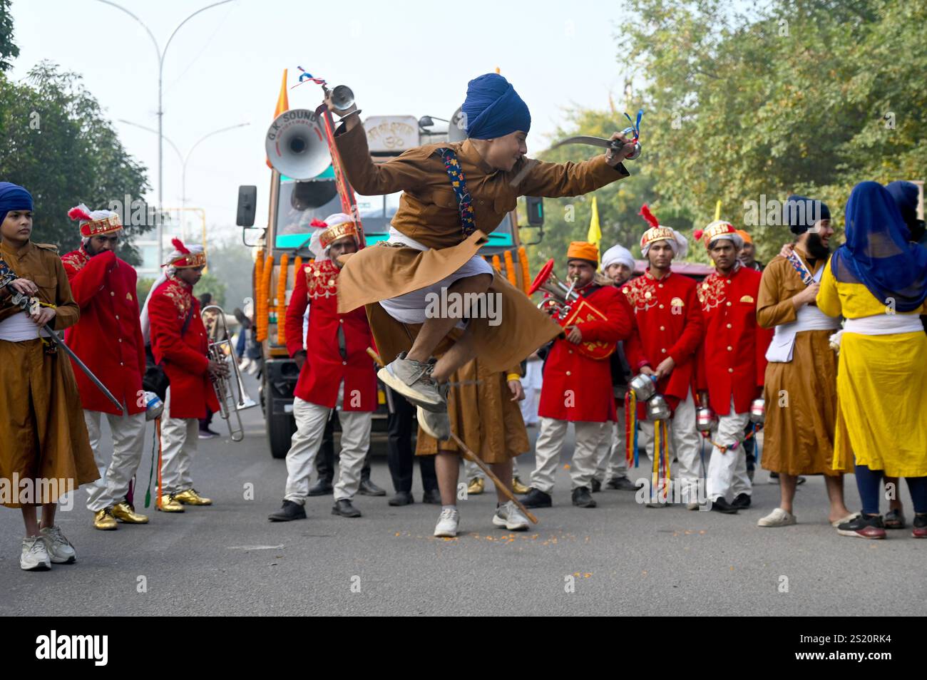 NOIDA, INDIA - JANUARY 5: Sikh devotees display Gatka martial art skills during a 'Nagar Kirtan ...