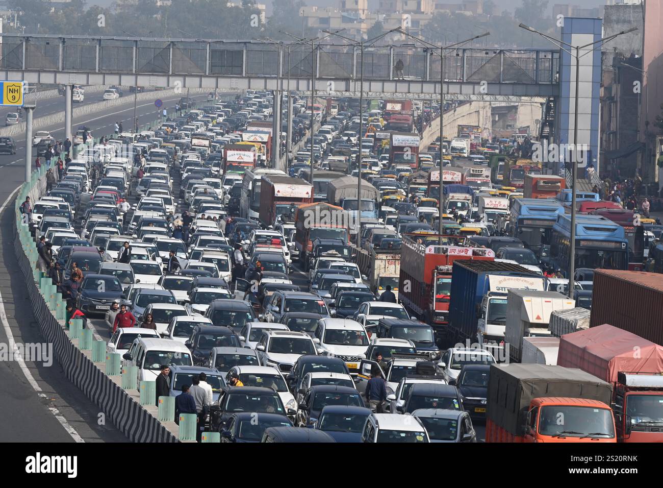 NEW DELHI, INDIA - JANUARY 5: Traffic being stopped on NH24 near ...