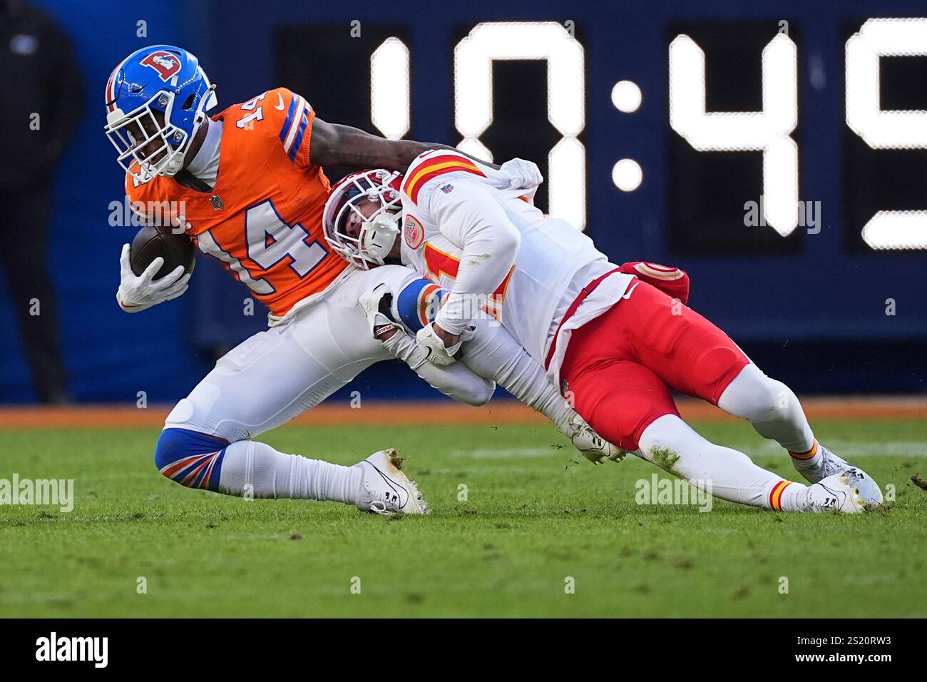 Denver Broncos wide receiver Courtland Sutton (14) is tackled by Kansas ...