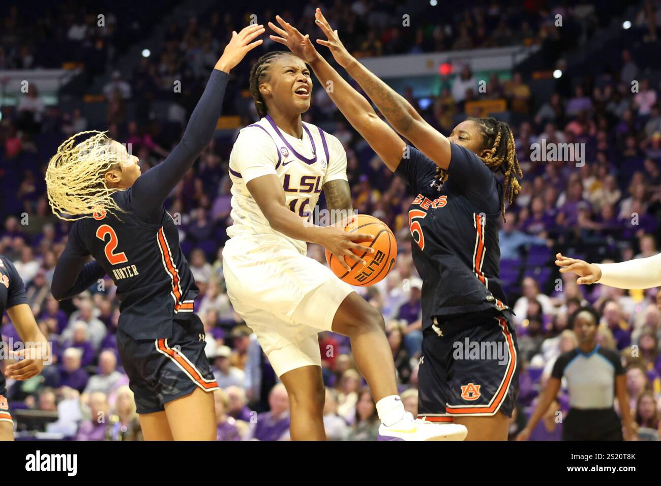 LSU Lady Tigers guard Kailyn Gilbert (16) attempts a layup between ...