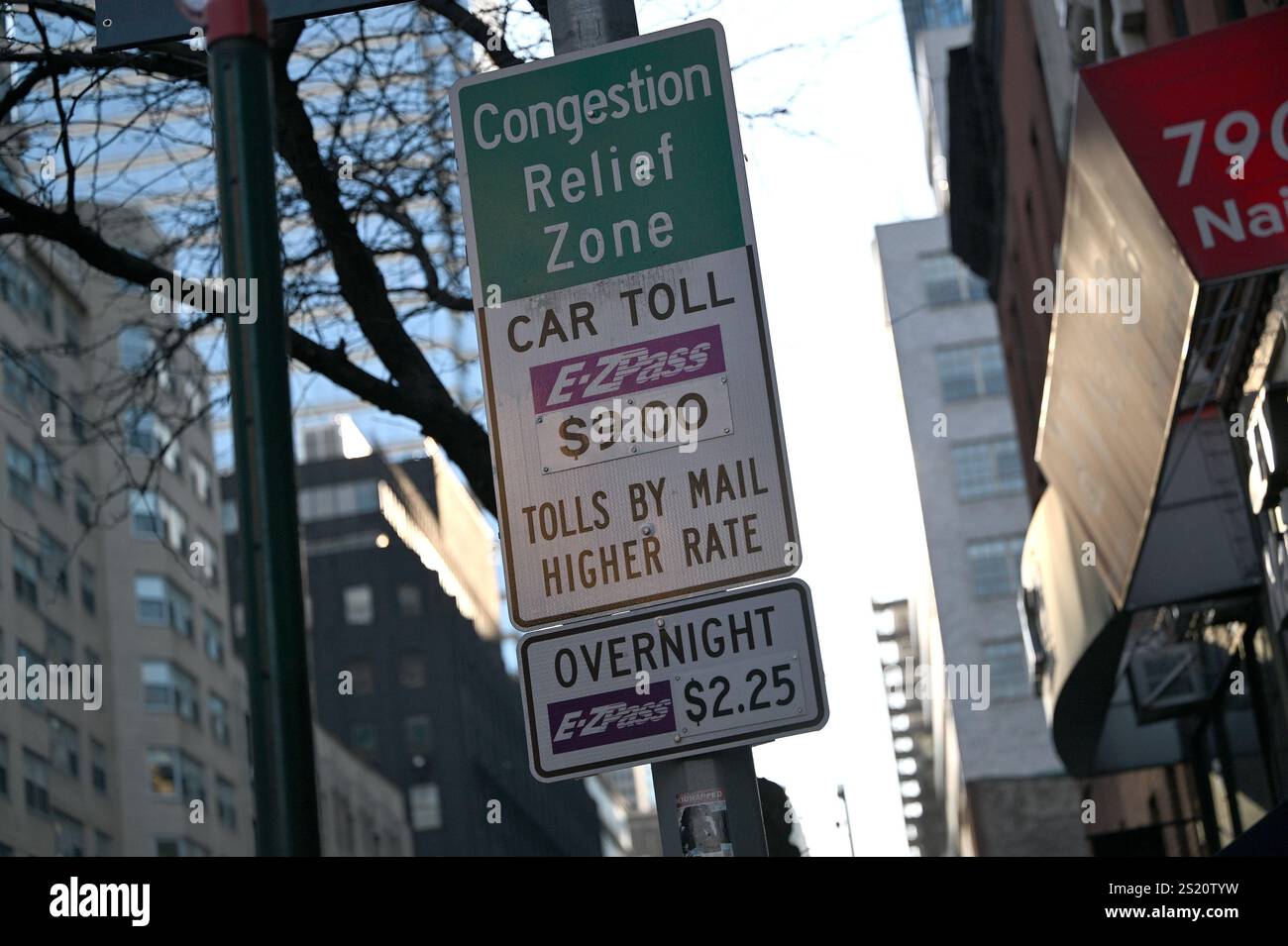 Signage for vehicle operators indicating they will pay a $9 toll charge ...