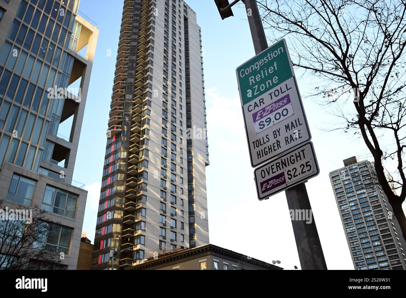 Signage for vehicle operators indicating they will pay a $9 toll charge ...