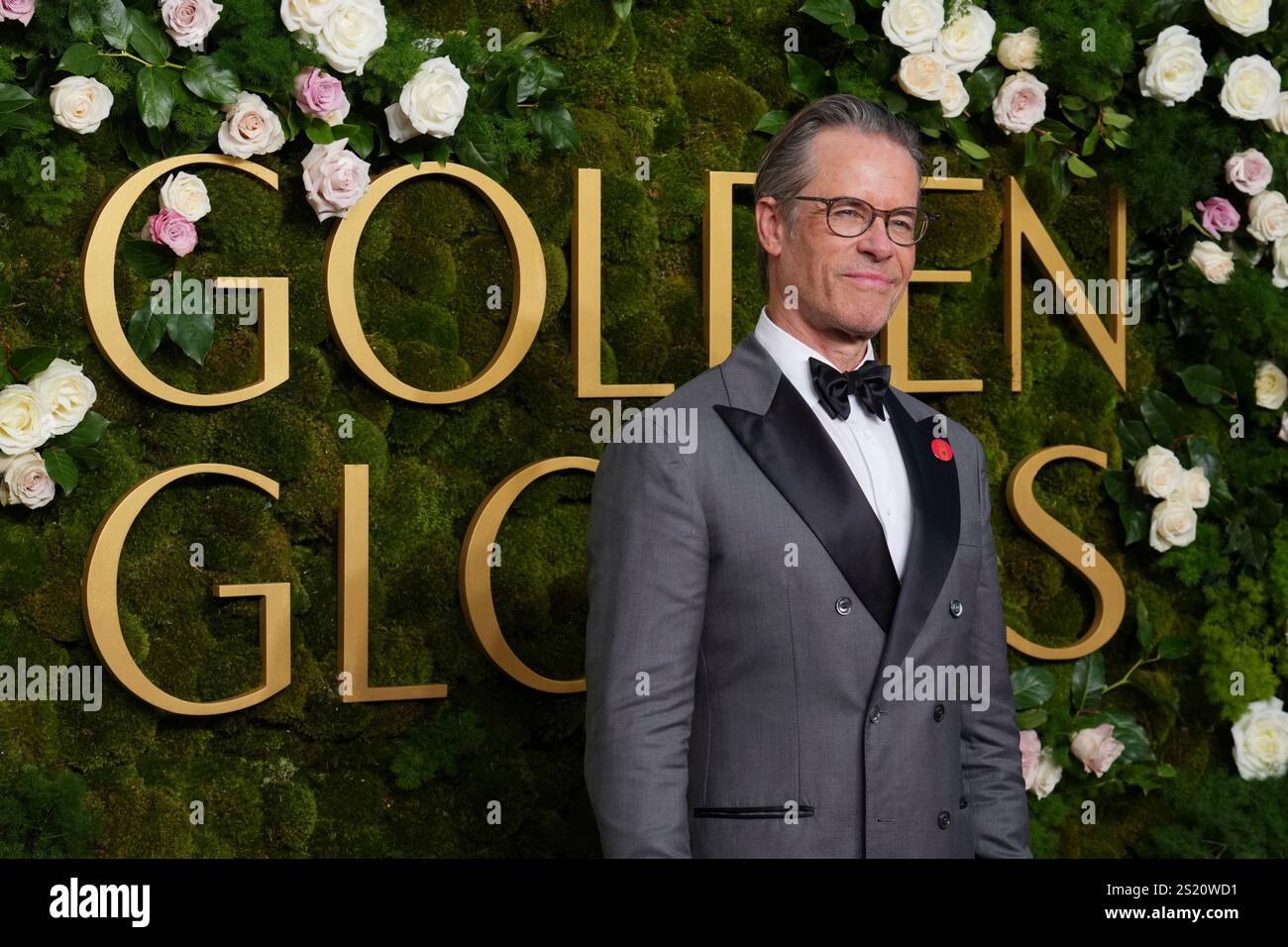Guy Pearce arrives at the 82nd Golden Globes on Sunday, Jan. 5, 2025 ...