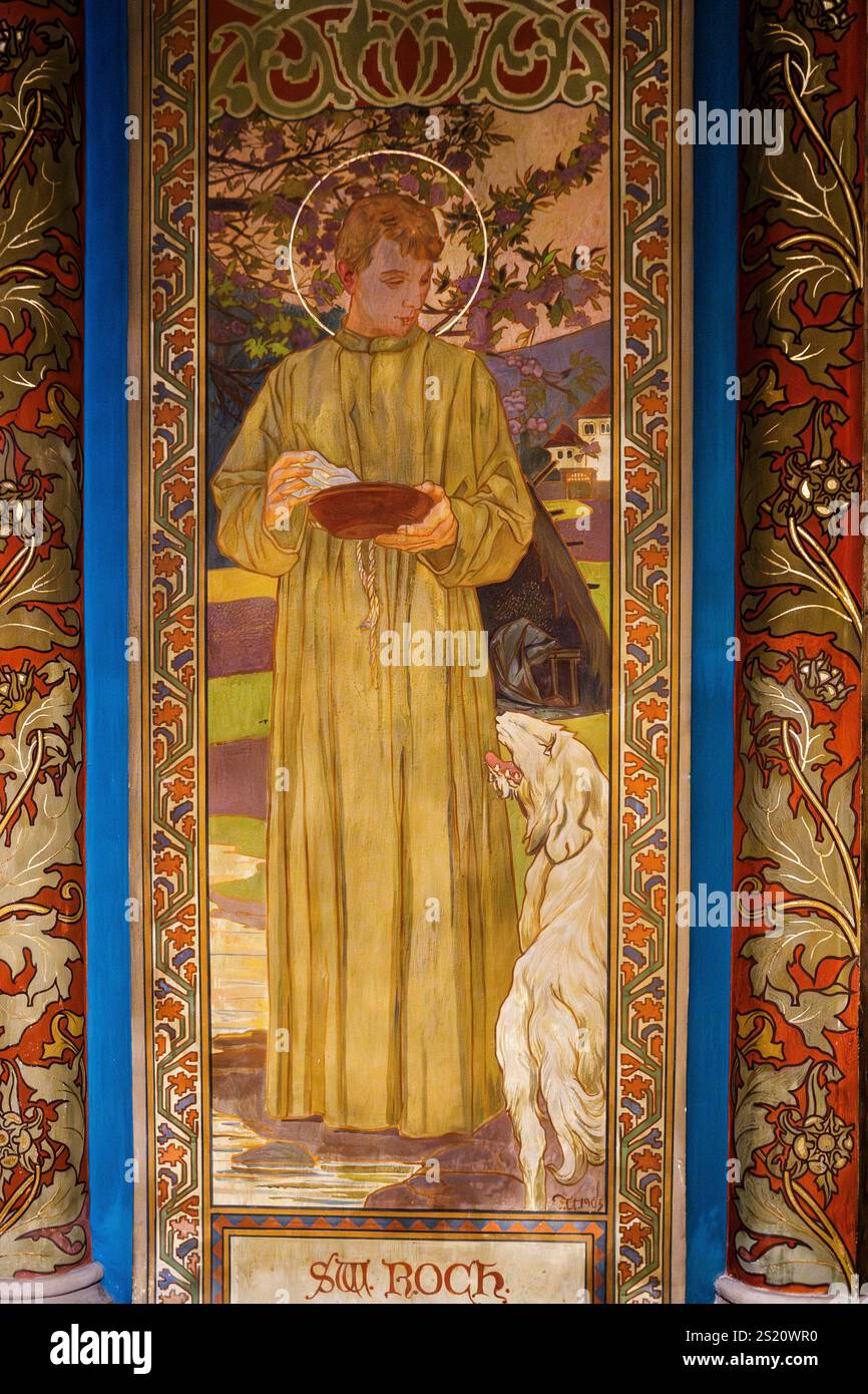 Art Nouveau style frescoes depticting Saint Roch on a column inside neo ...