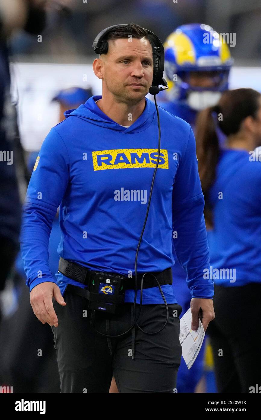 Los Angeles Rams defensive coordinator Chris Shula walk along the ...