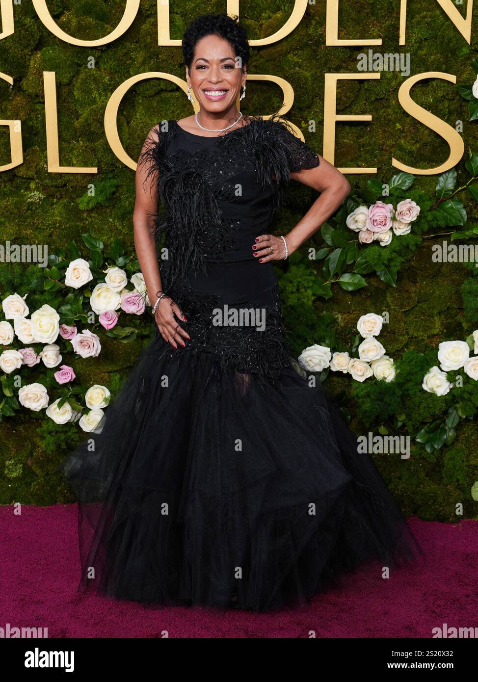Liza Colon-Zayas walking on the red carpet at The 82nd Annual Golden ...