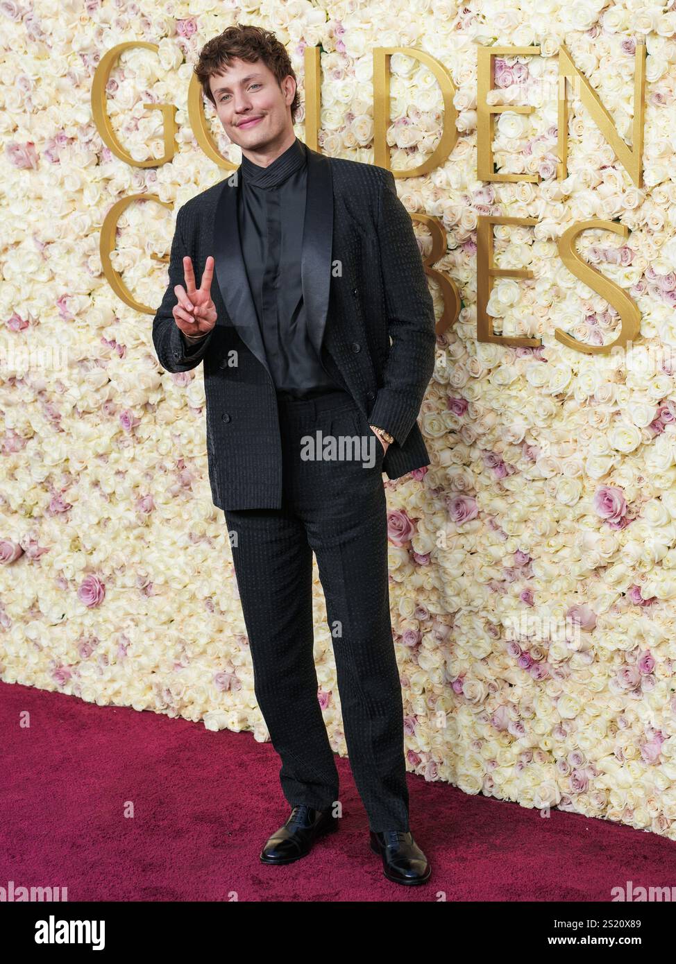 Matt Rife walking on the red carpet at The 82nd Annual Golden Globe ...