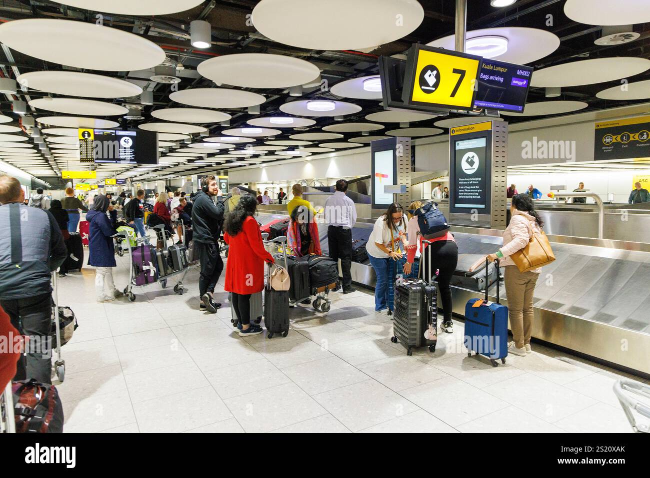 Baggage reclaim, Heathrow, airport, London, UK Stock Photo - Alamy