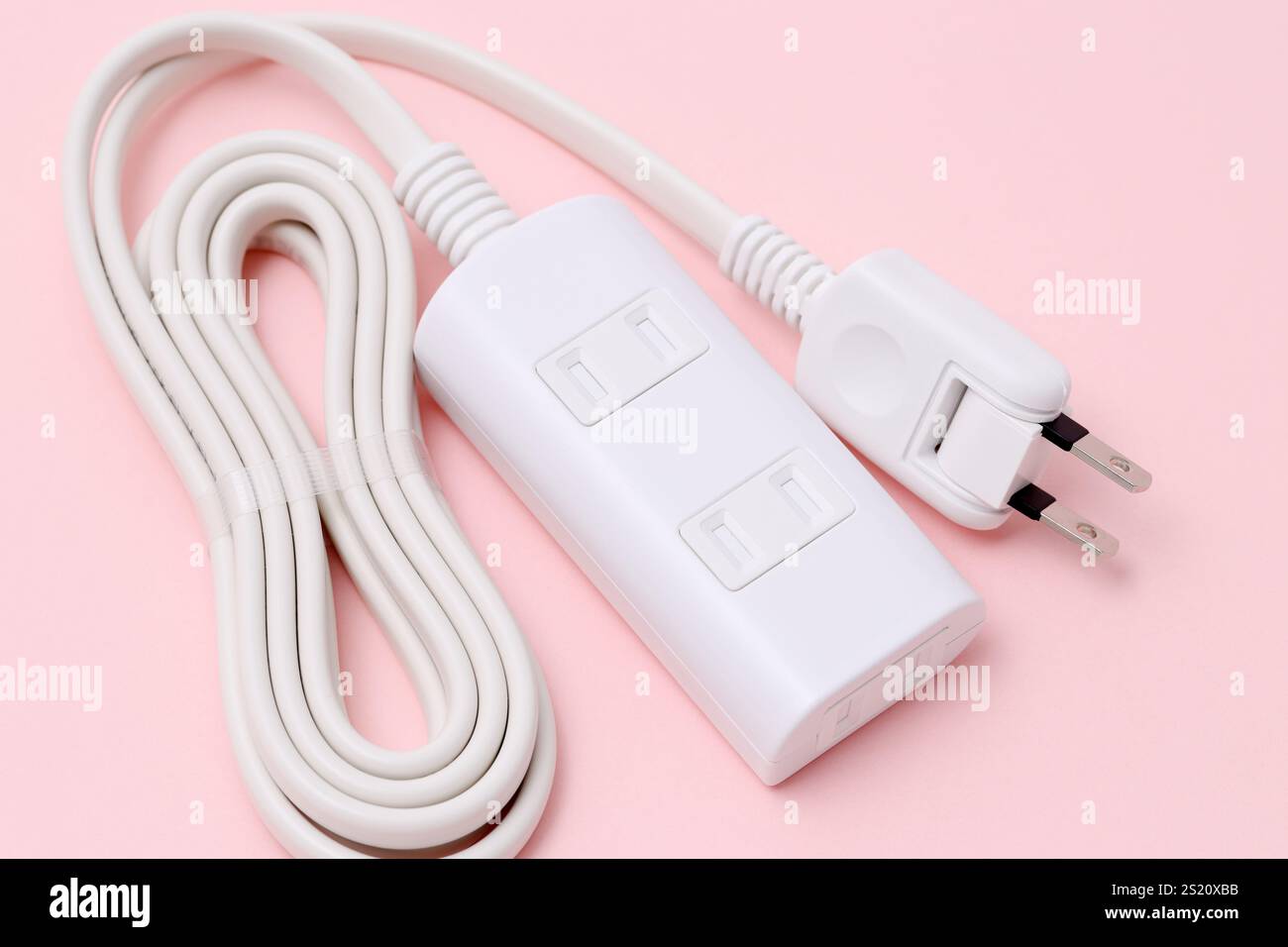Extension with socket on white background. Electrical power strip or ...