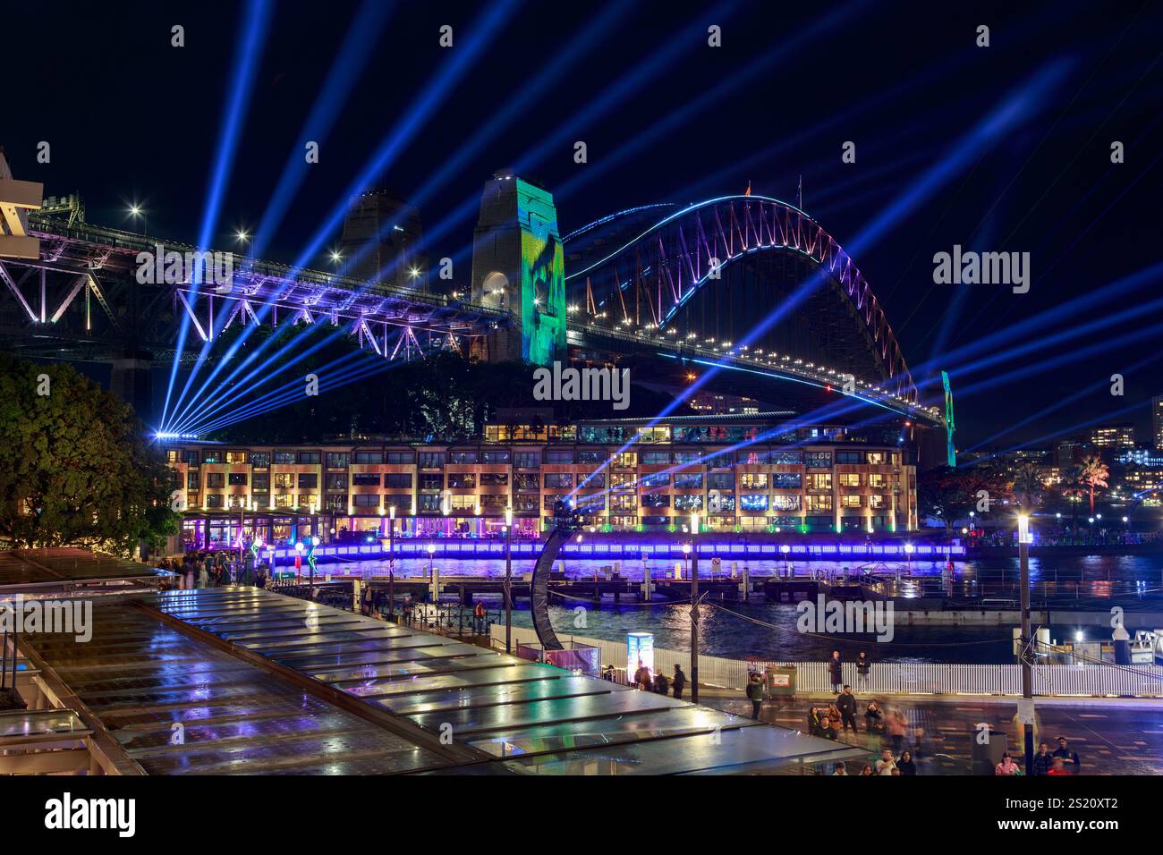 The Sydney Harbour Bridge and Campbells Cove illuminated for the annual ...
