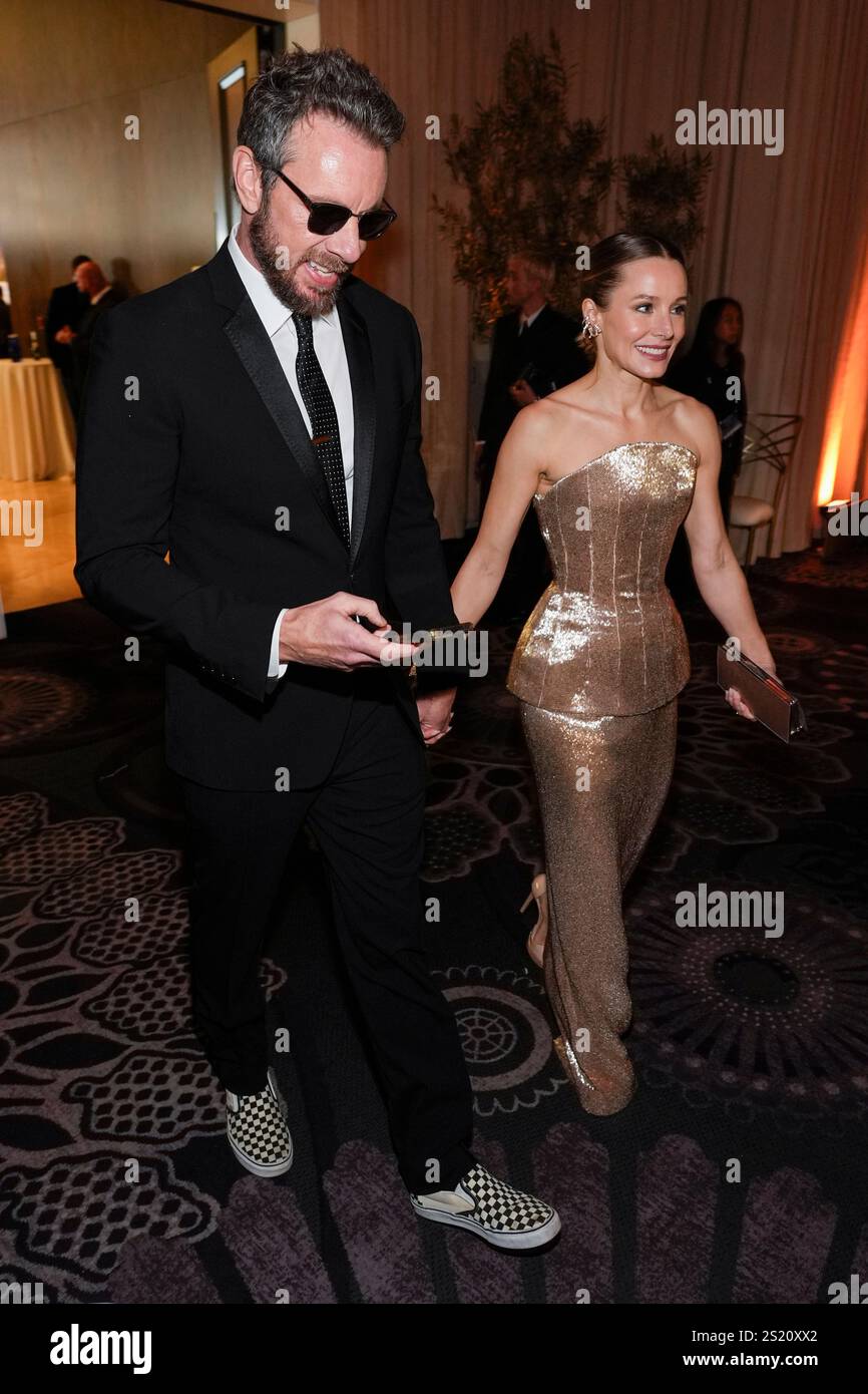 Dax Shepard, left, and Kristen Bell arrive at the 82nd Golden Globes on ...