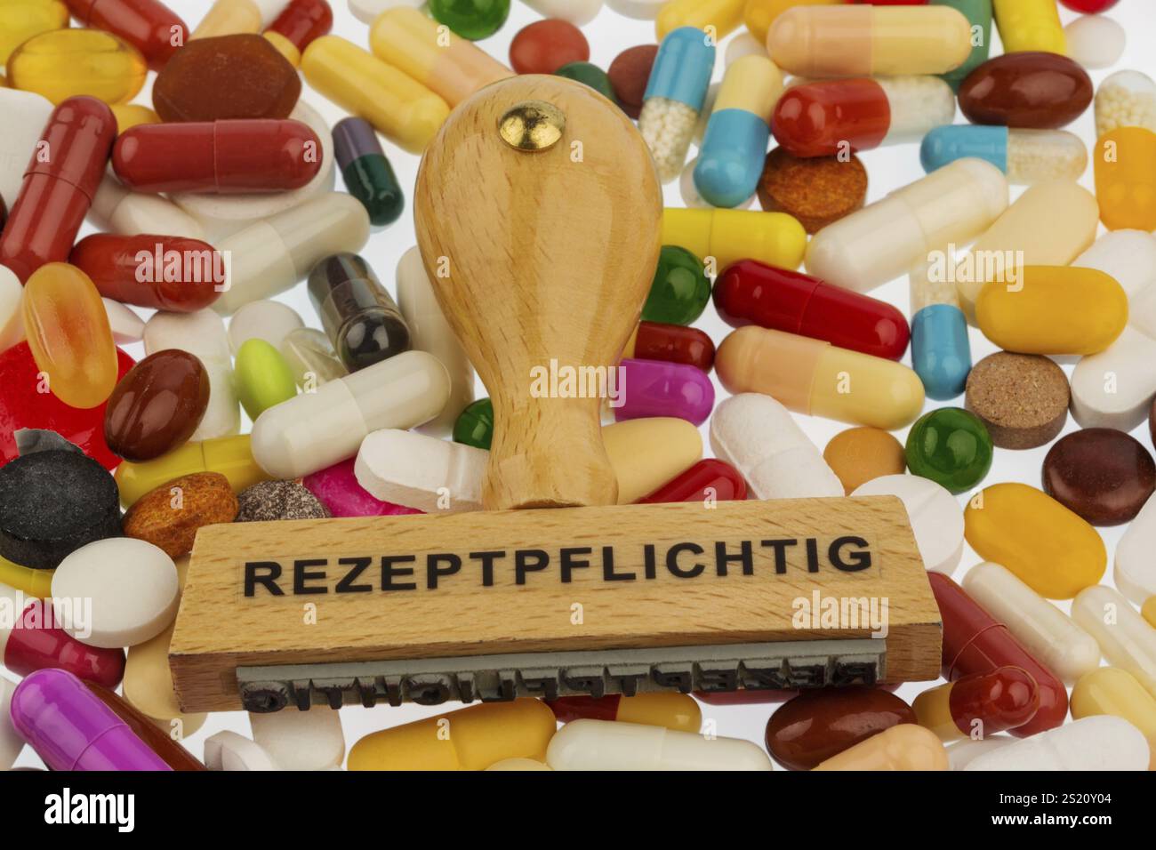 Stamp on coloured tablets, symbol photo for medication, prescription ...