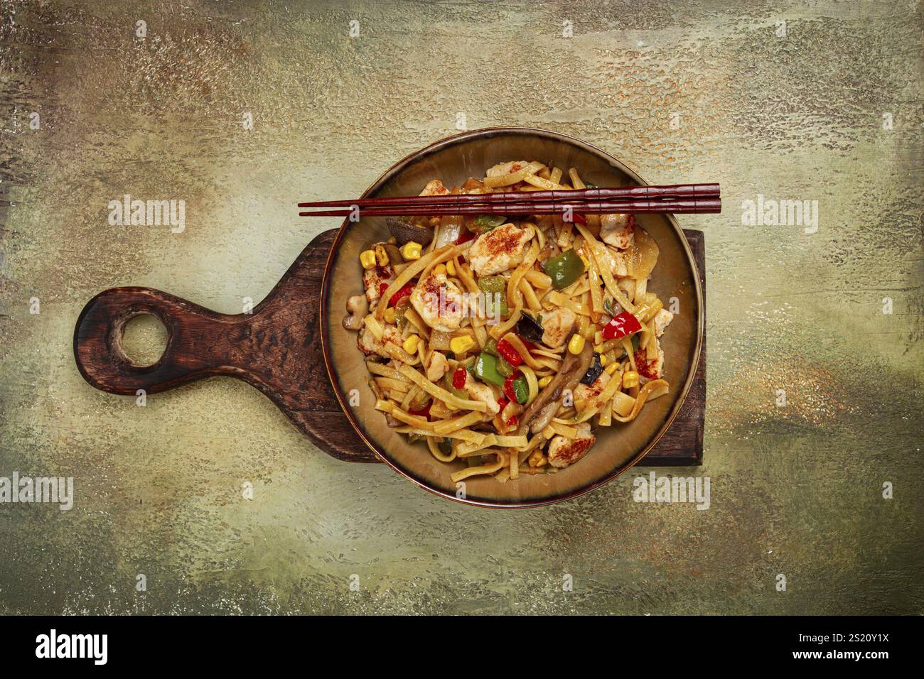 Fried noodles with chicken meat and vegetables, Bami Goreng, Indonesian ...