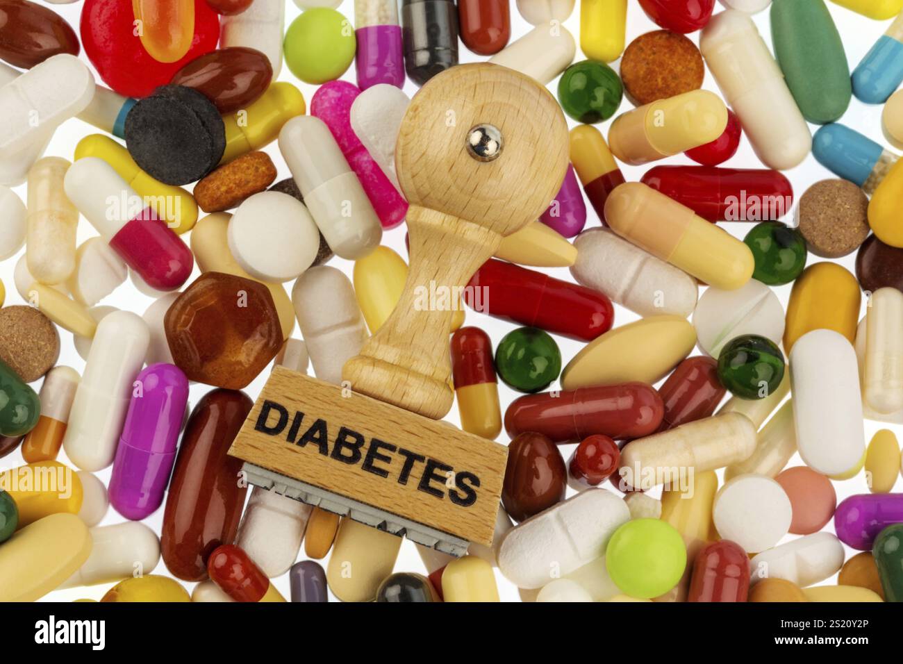 Stamp on colourful tablets, symbol photo for diabetes, prescription and ...