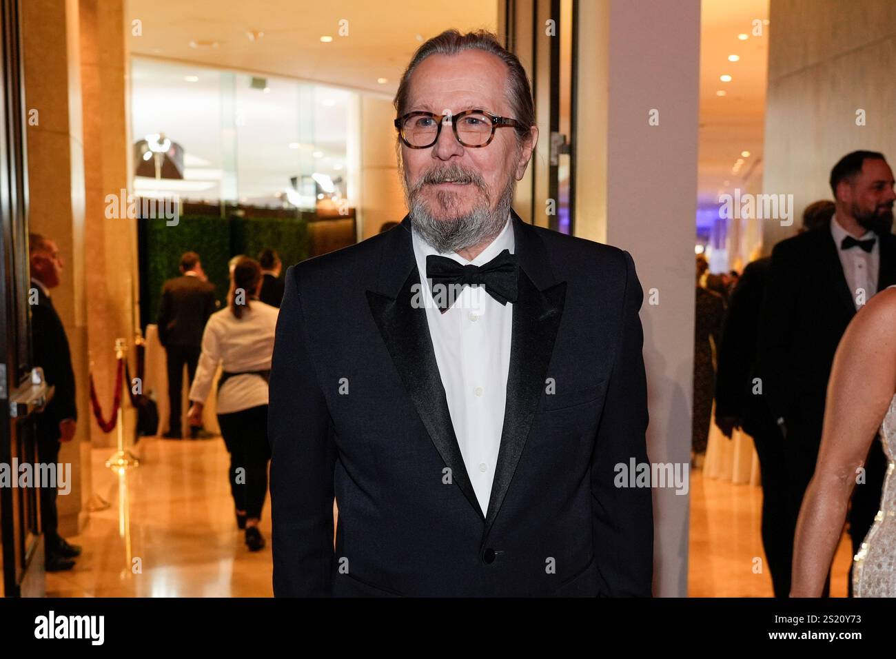 Gary Oldman arrives at the 82nd Golden Globes on Sunday, Jan. 5, 2025 ...