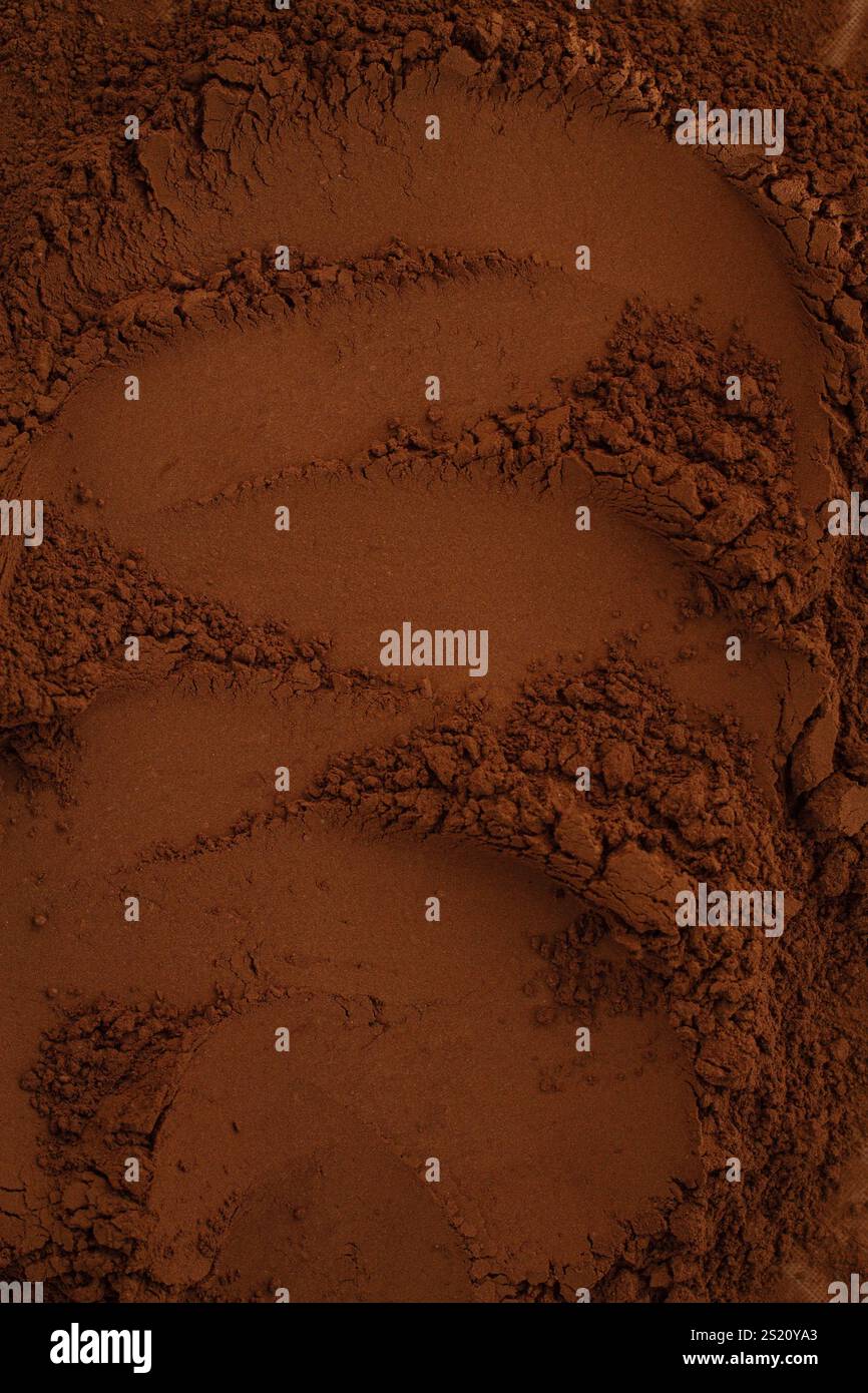 Cocoa powder, full frame, cocoa background, top view, texture, close-up ...