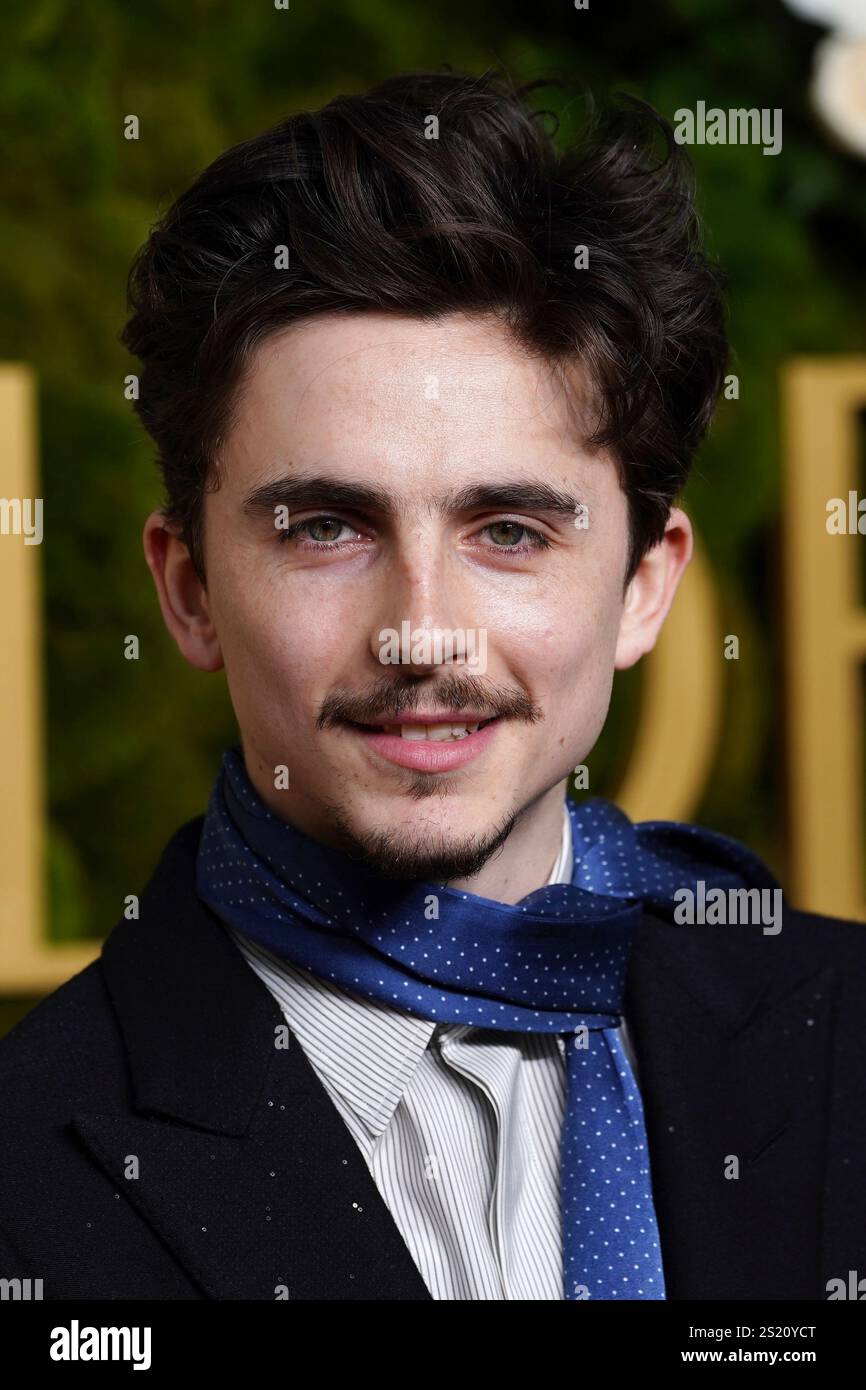 Timothee Chalamet arrives at the 82nd Golden Globes on Sunday, Jan. 5 ...