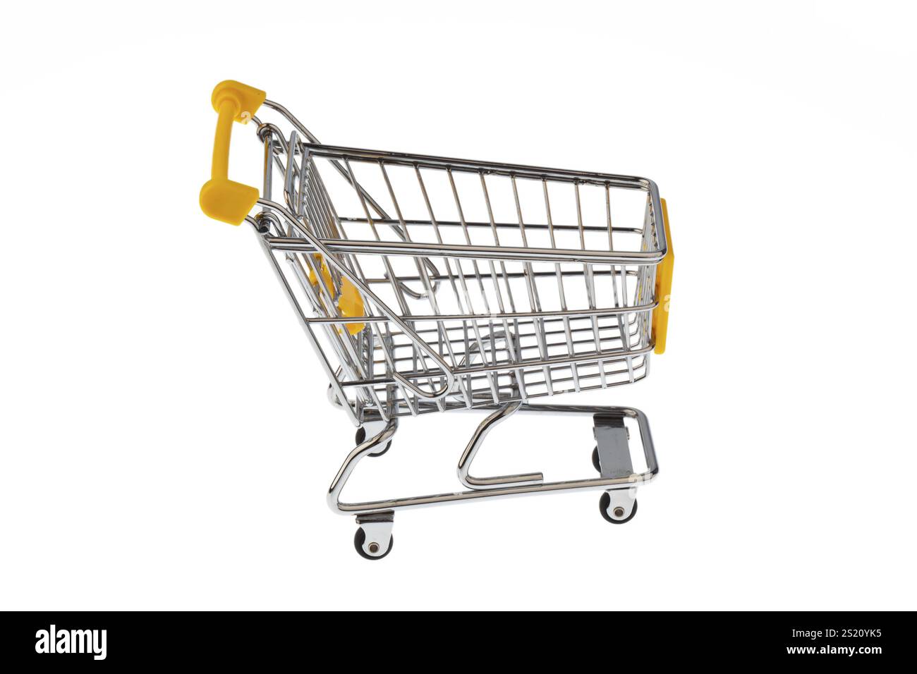 A shopping trolley on a white background. Symbolising shopping and ...