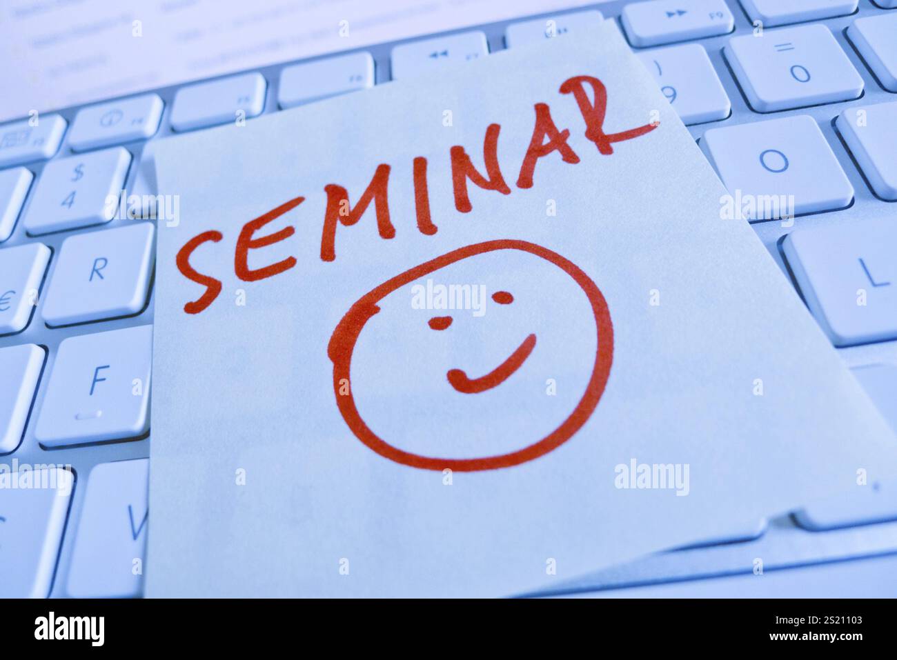 A note on the keyboard of a computer as a reminder: Seminar Austria ...