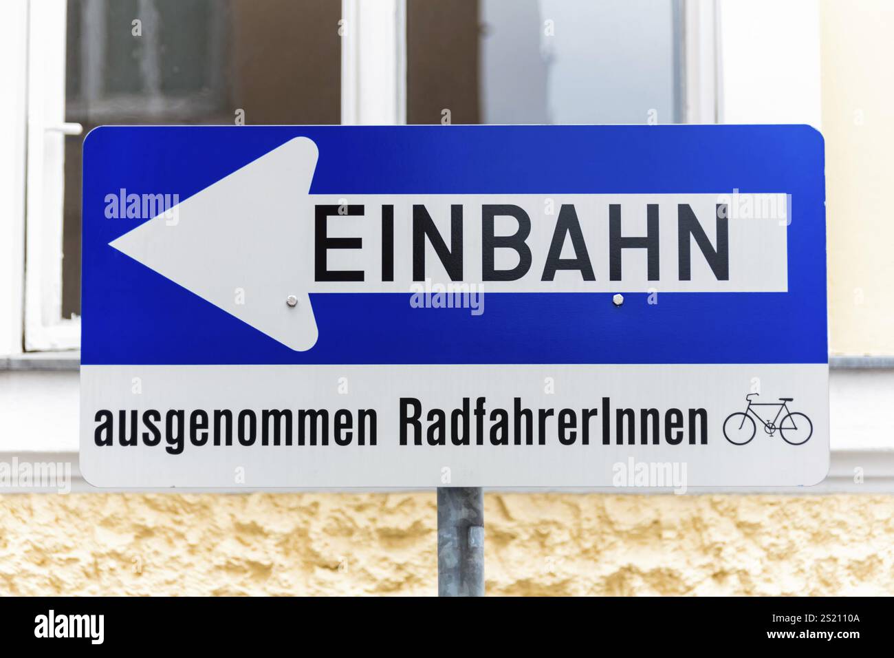 One-way street, traffic sign with addition, exception for cyclists ...