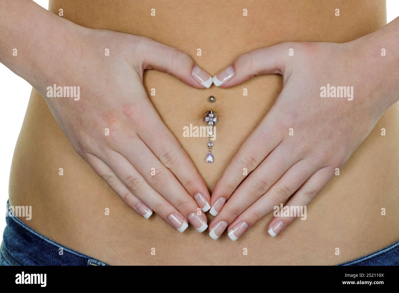 A woman has stomach ache or stomach pain. Hands in heart shape around ...