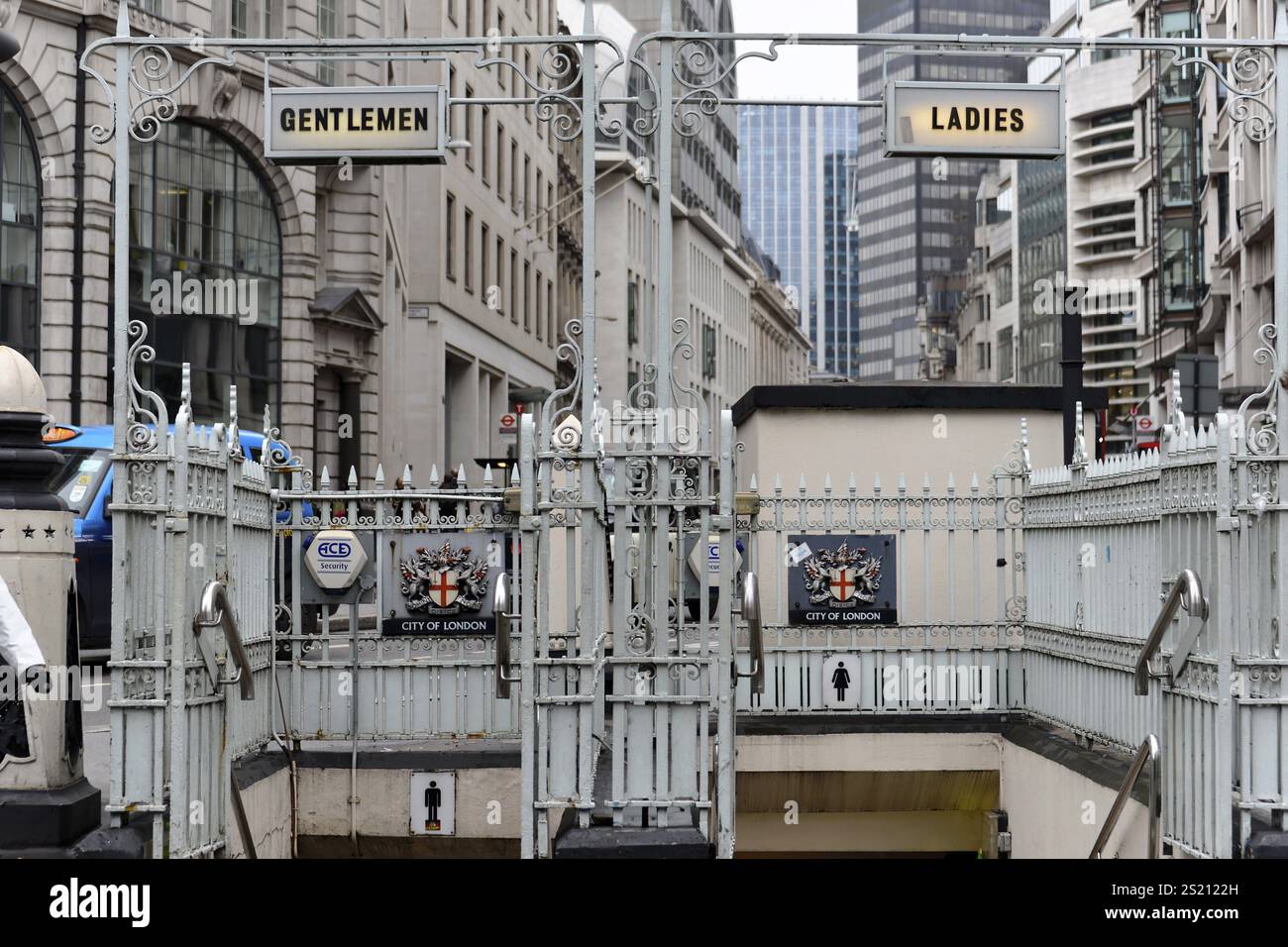 Toilets, Historic entrance staircase with lattice gate in a street ...