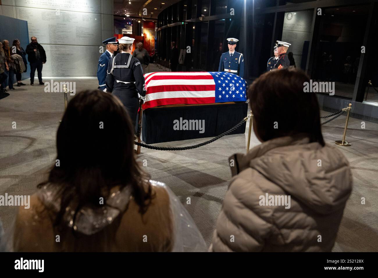 Mourners view the casket of former President Jimmy Carter as he lies in repose at the Jimmy ...