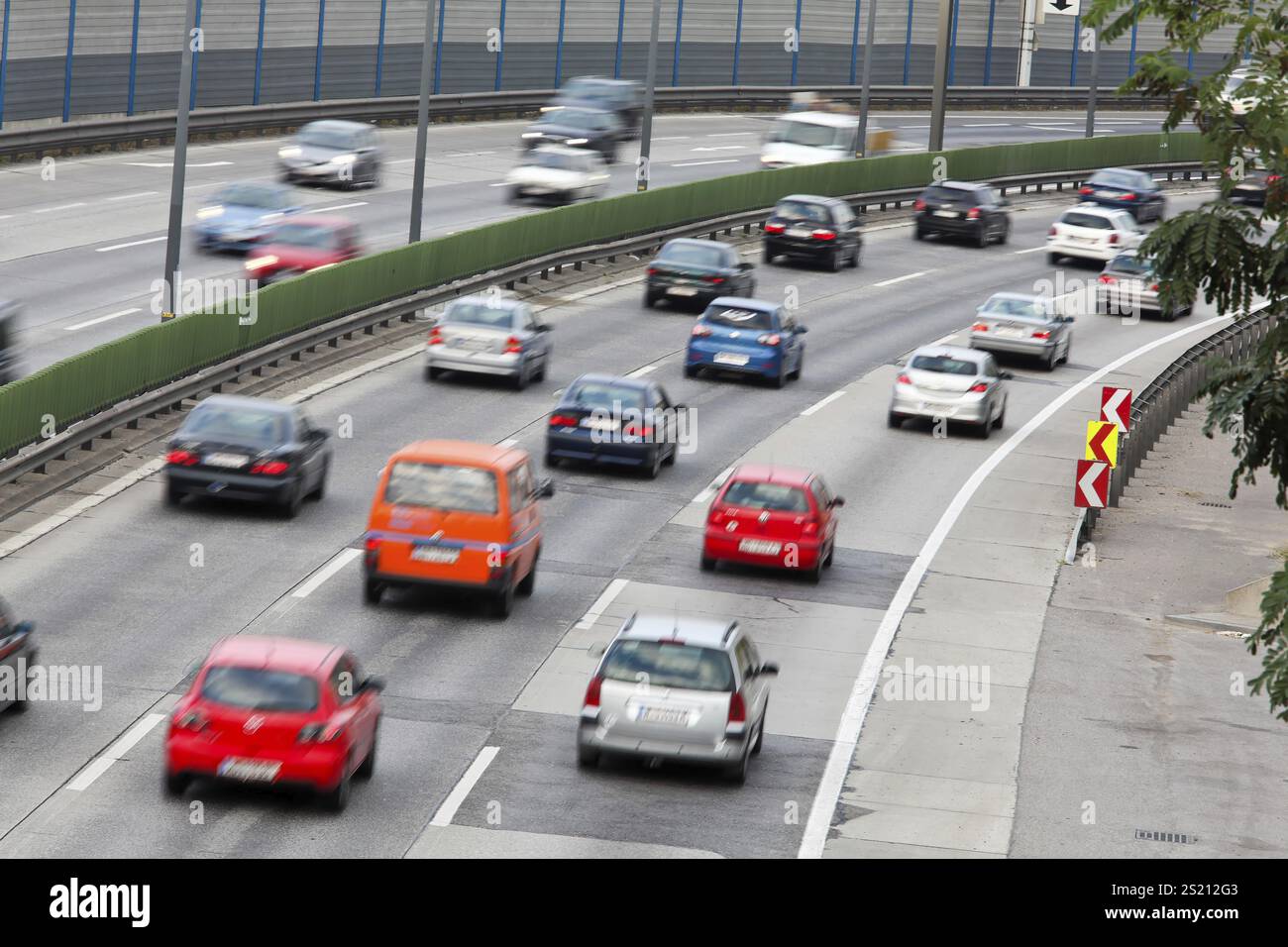 Traffic jam with cars on a motorway road motorway in the evening ...