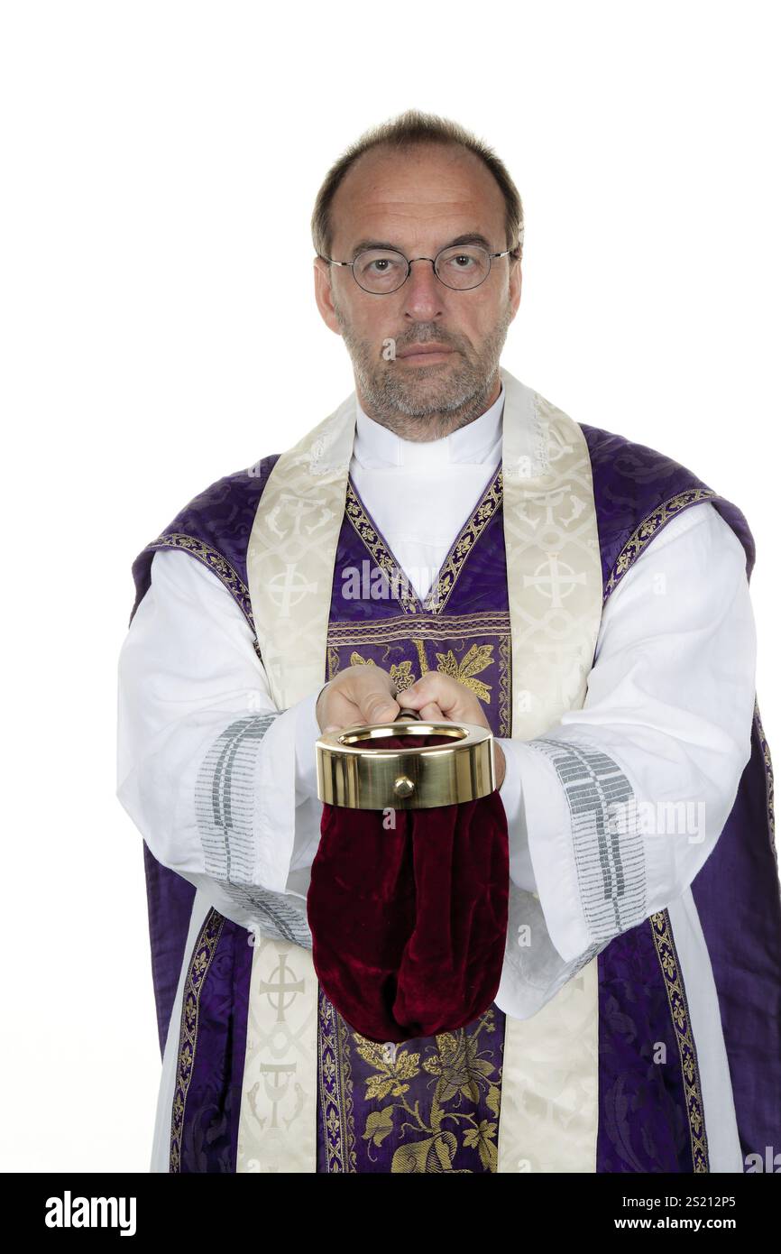 A Catholic priest collects money for the Church of Austria Stock Photo ...