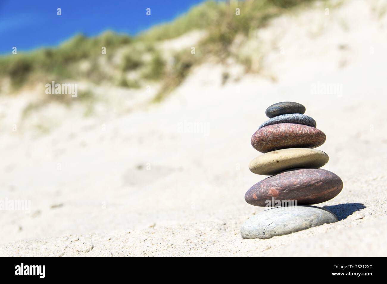 Round pebbles on the beach in Denmark is a symbol for balance. Stones ...