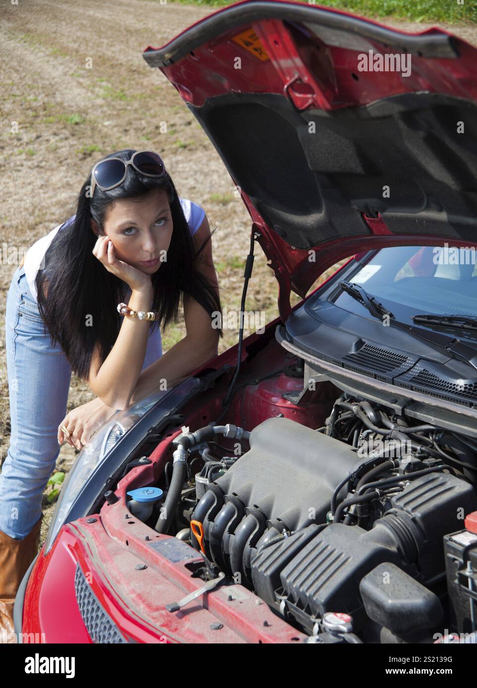 Young woman's car breaks down. Engine failure Austria Stock Photo - Alamy