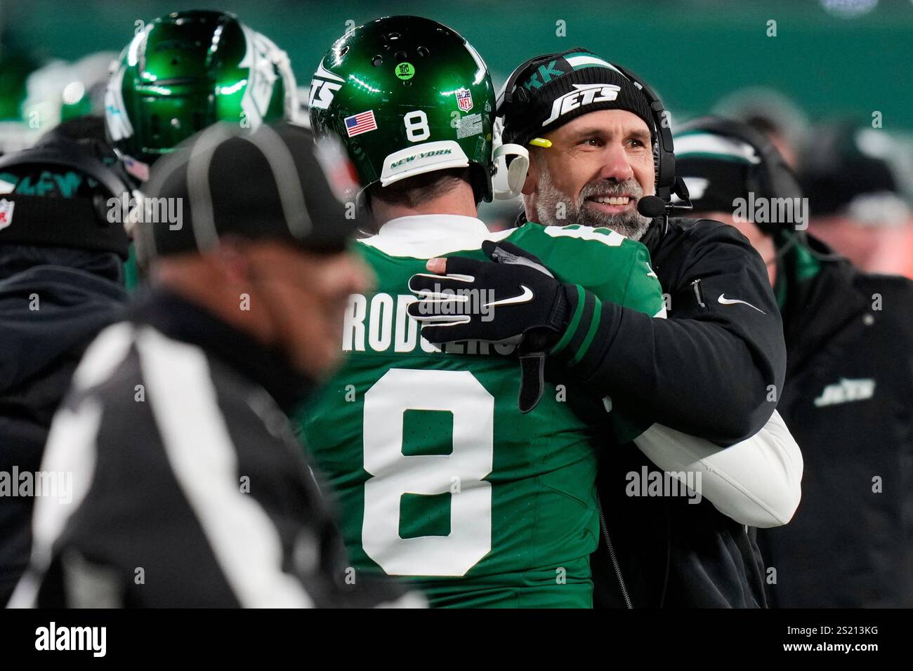 New York Jets quarterback Aaron Rodgers (8) and head coach Jeff Ulbrich ...