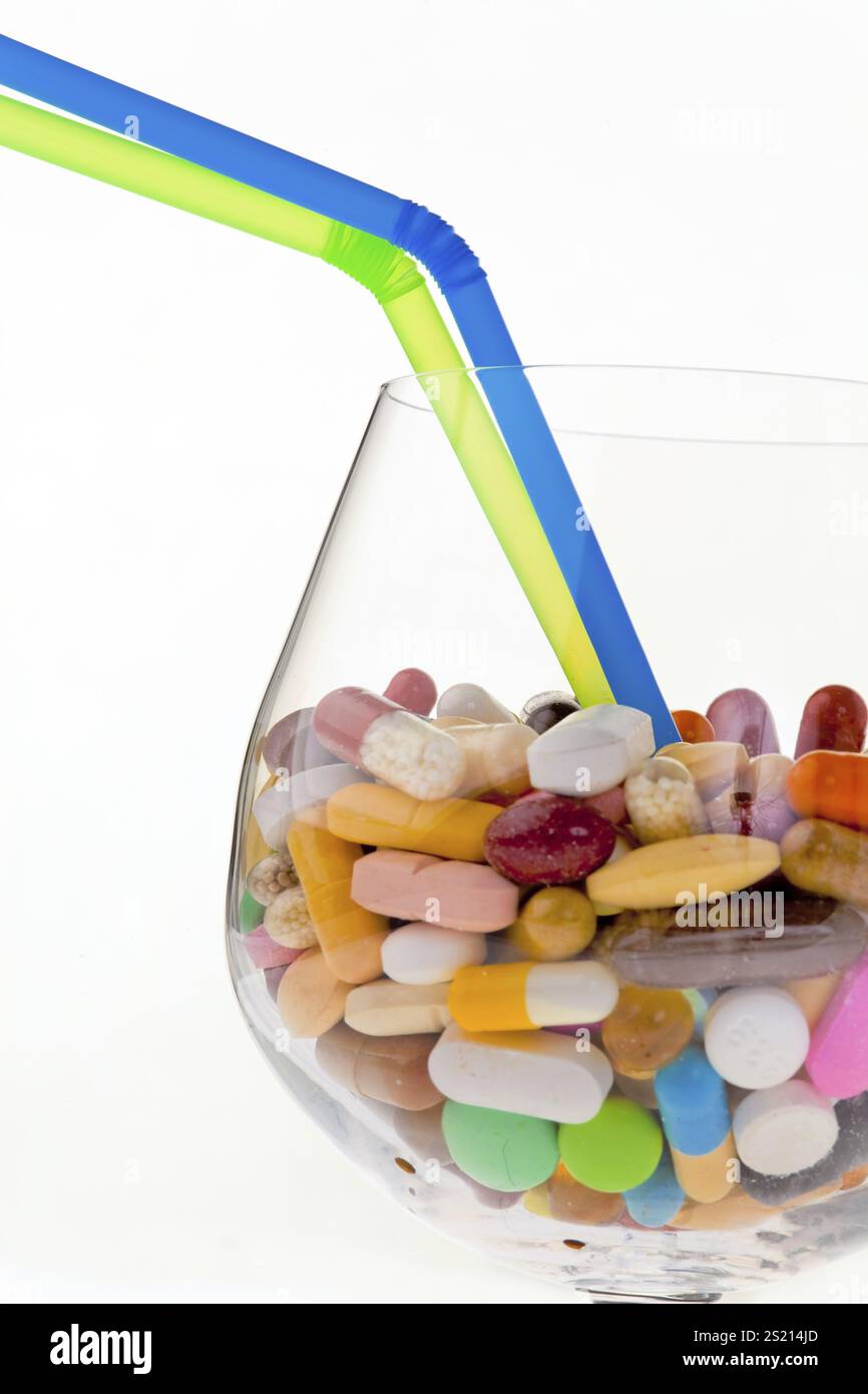 Symbol photo for tablets and medication addiction Stock Photo - Alamy