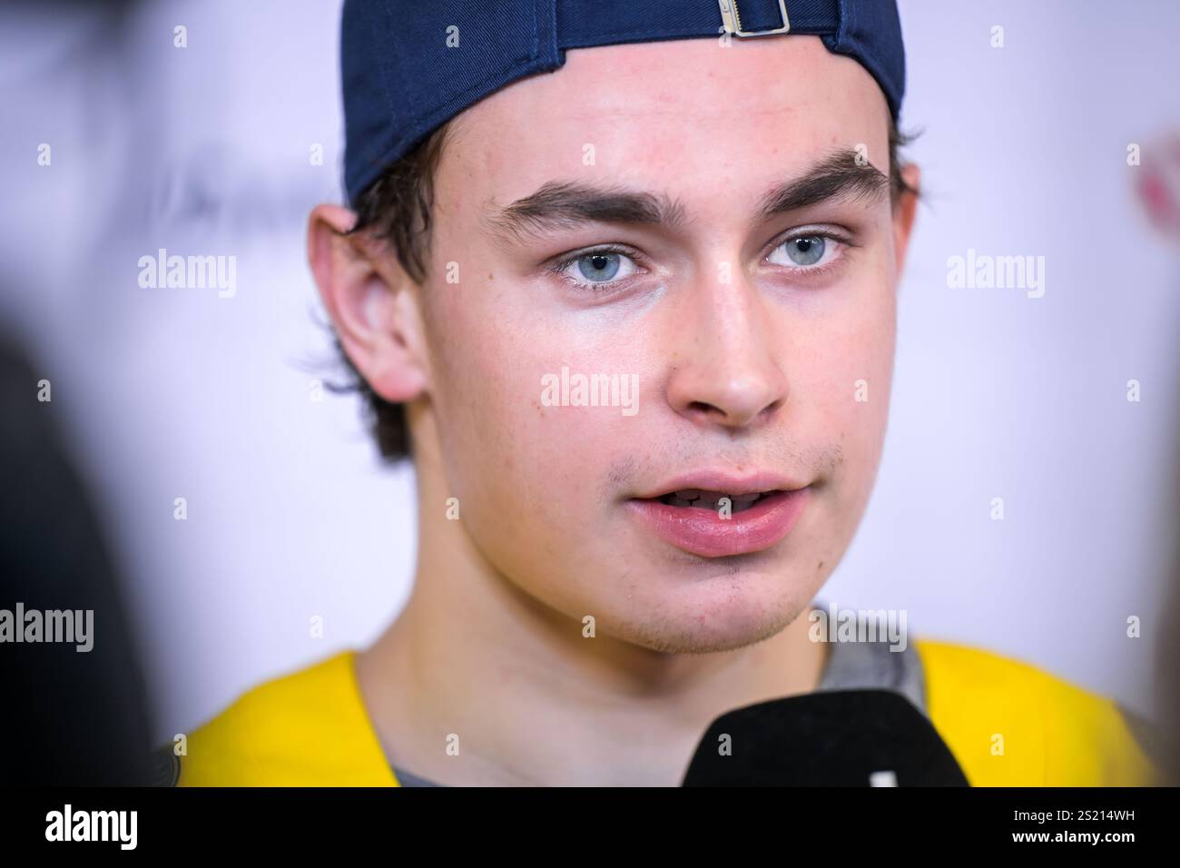 Felix Unger Sörum of, Sweden. , . being interviewed after the 2025 IIHF ...