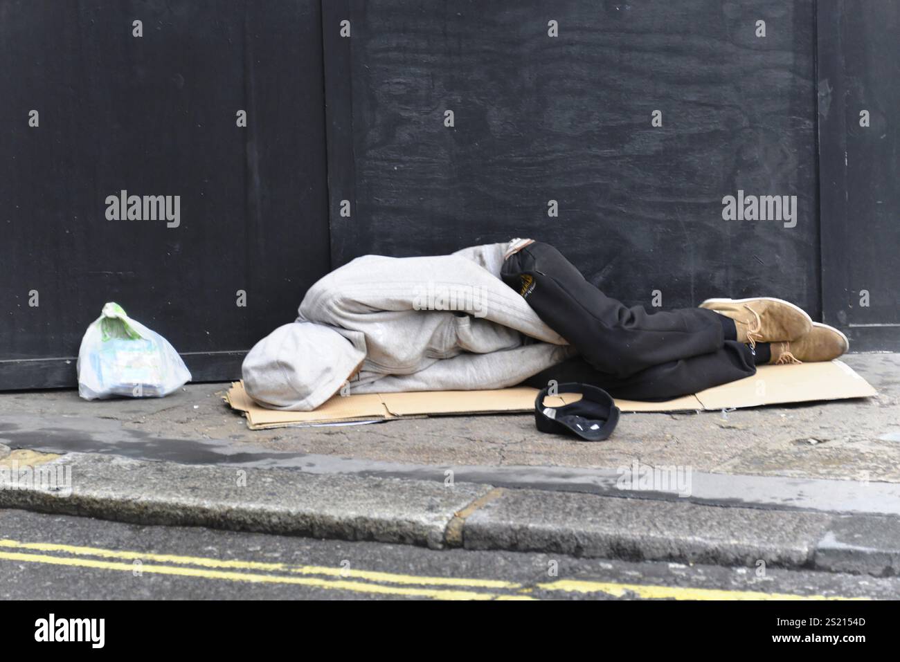 Homeless person, sleeping, Oxford Street, London, London region ...