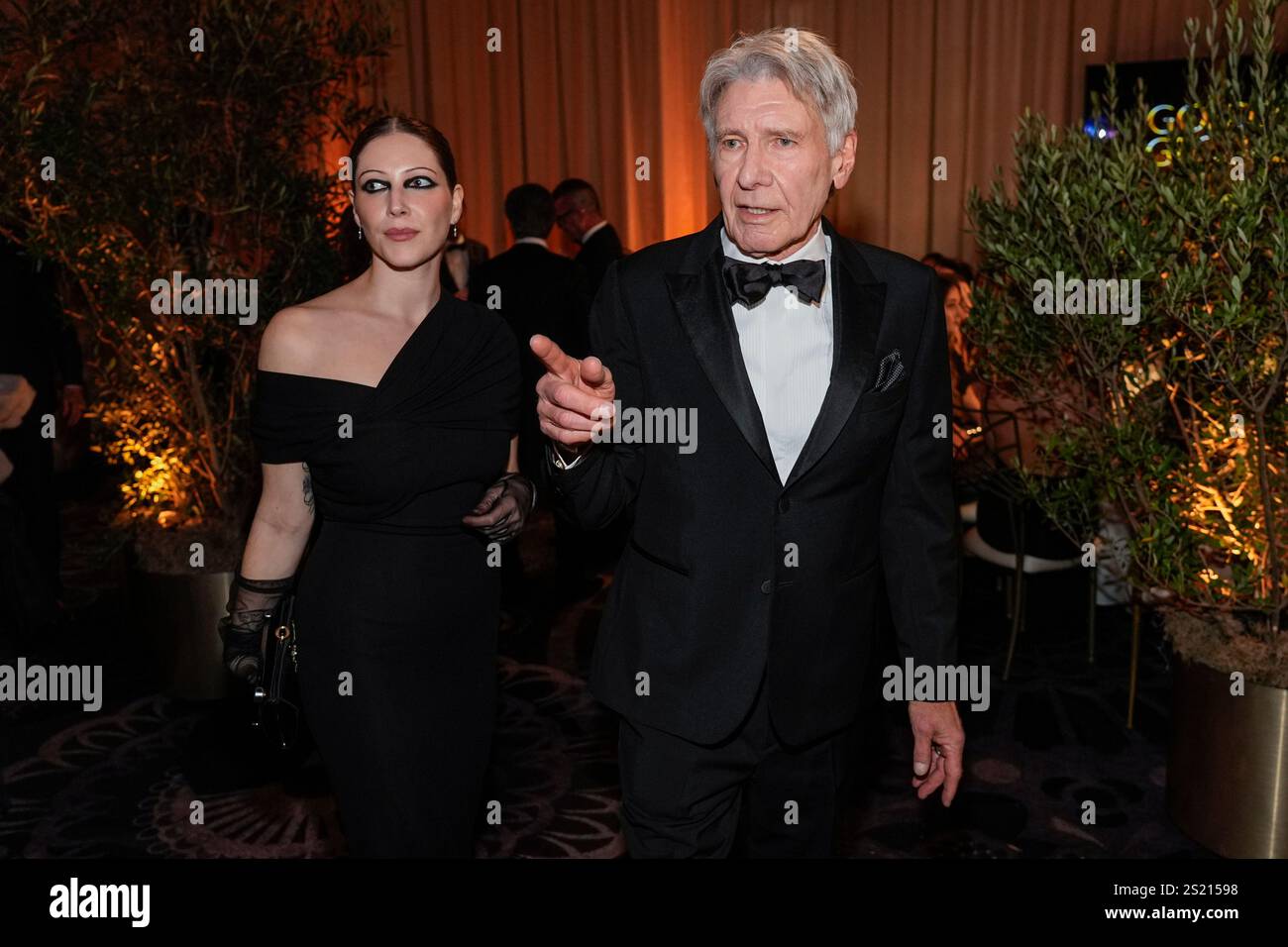 Georgia Ford, left, and Harrison Ford arrive at the 82nd Golden Globes ...