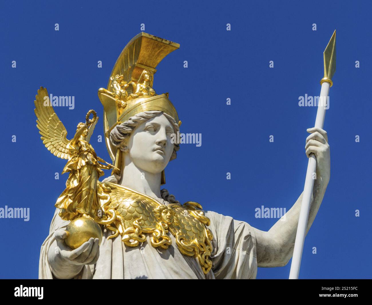 The parliament in Vienna, Austria. With the statue of Pallas Athena, the Greek goddess of wisdom ...