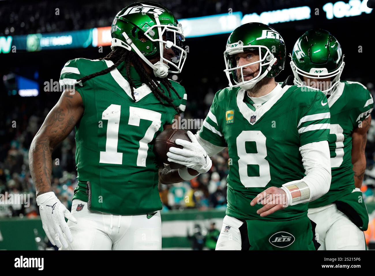 New York Jets quarterback Aaron Rodgers (8) reacts after throwing a ...