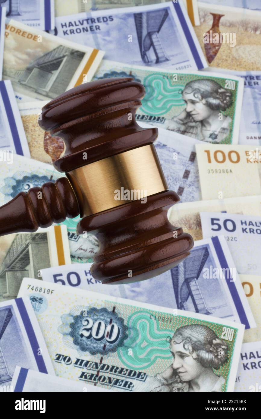 Danish kroner. Currency from Denmark in Europe. Judge's gavel. Cost of ...