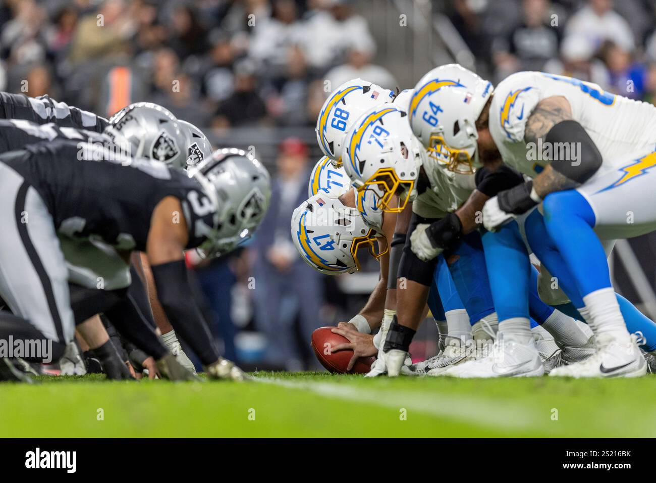 The Los Angeles Chargers line up against the Las Vegas Raiders in an ...