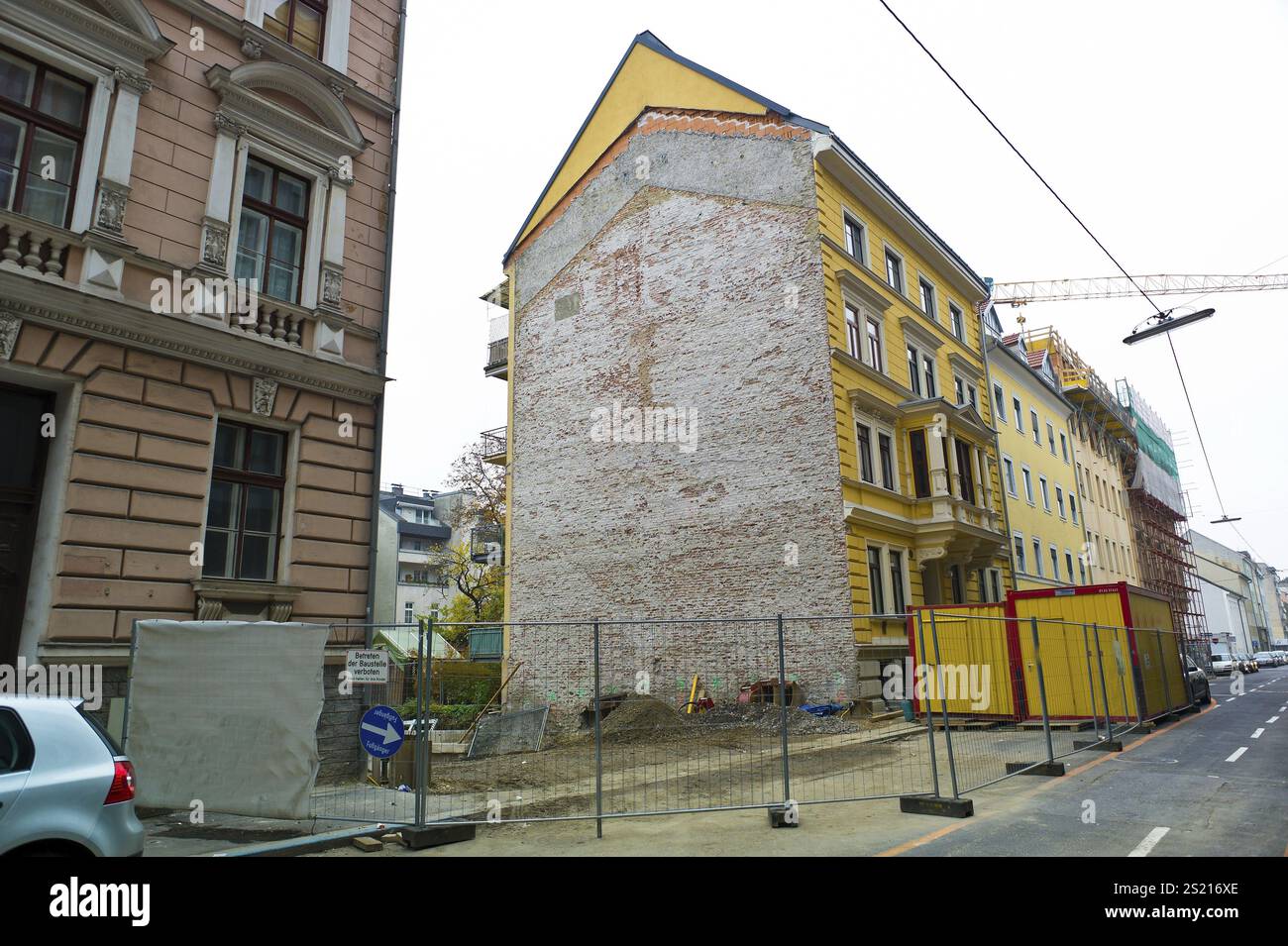 A gap between two houses in a town. Austria Stock Photo - Alamy